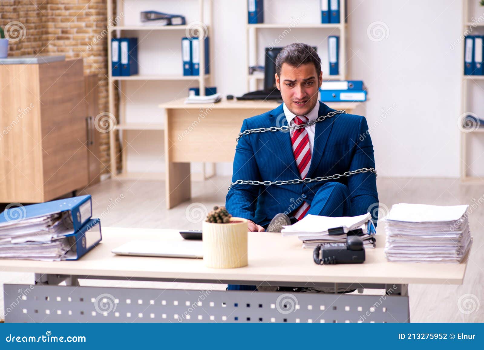 Chained Male Employee Working in the Office Stock Photo - Image of ...