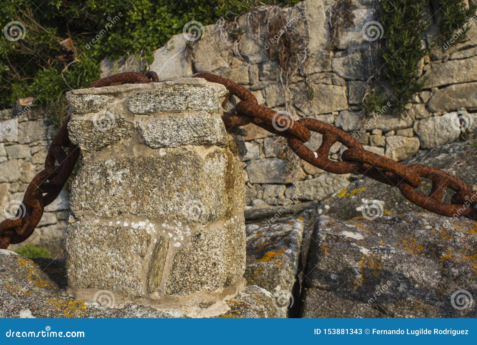 Chained rock columns stock image. Image of chained, wall - 153881343