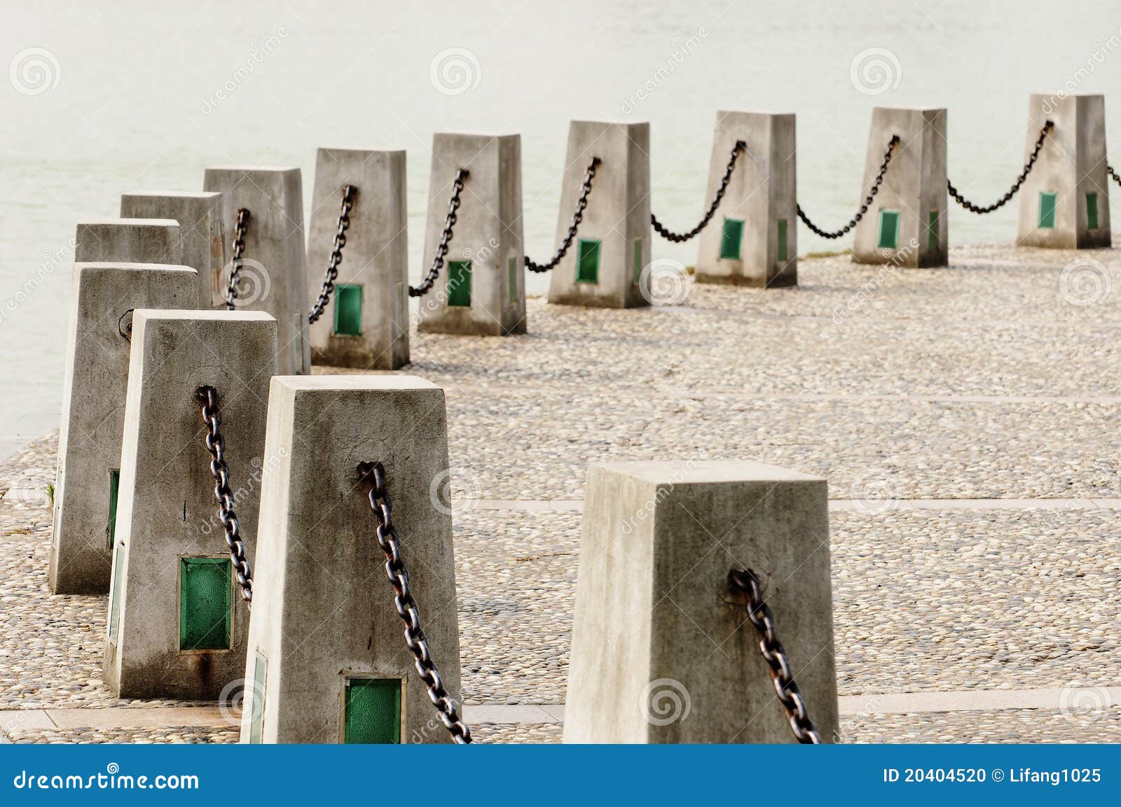 Chains and cement posts stock photo. Image of green, boardwalk - 20404520