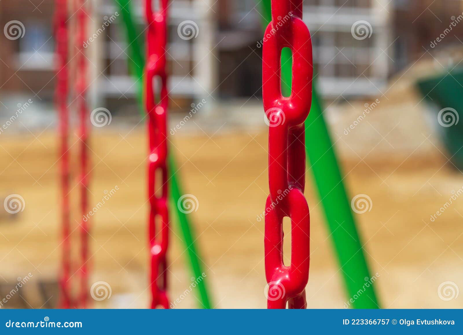 Chains Covered with Red Rubber Coating for Safety on Swings in the ...
