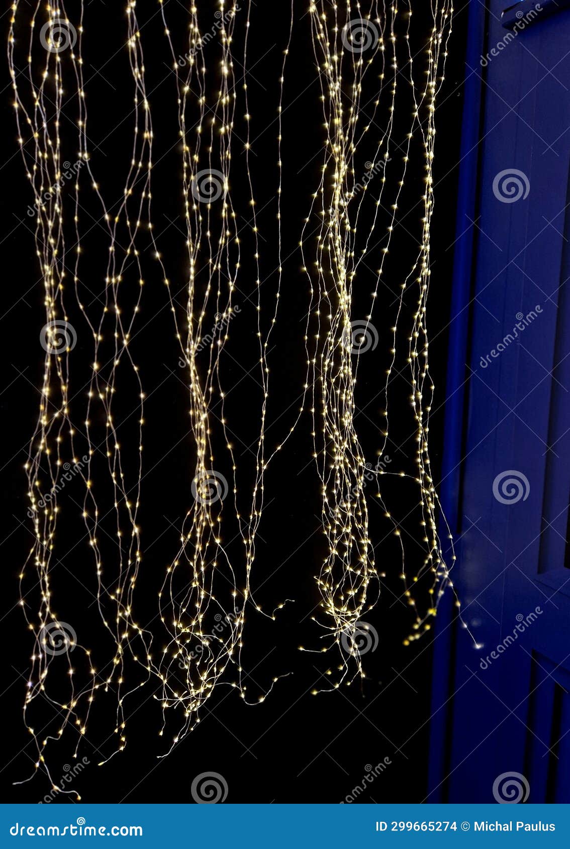 Chains of Light on a Dark Blue Background Resemble a Starry Sky at ...