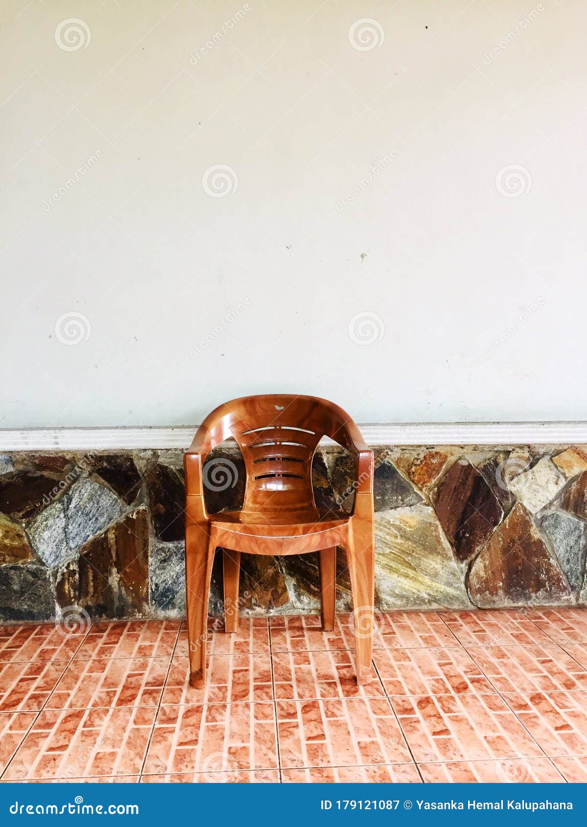 A Chair is in Front of a Wall Stock Image - Image of color, object ...