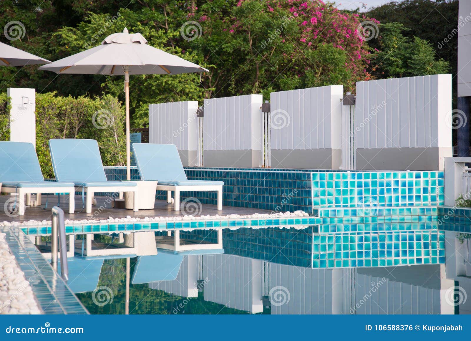 Chair near the pool stock photo. Image of hotel, resort - 106588376