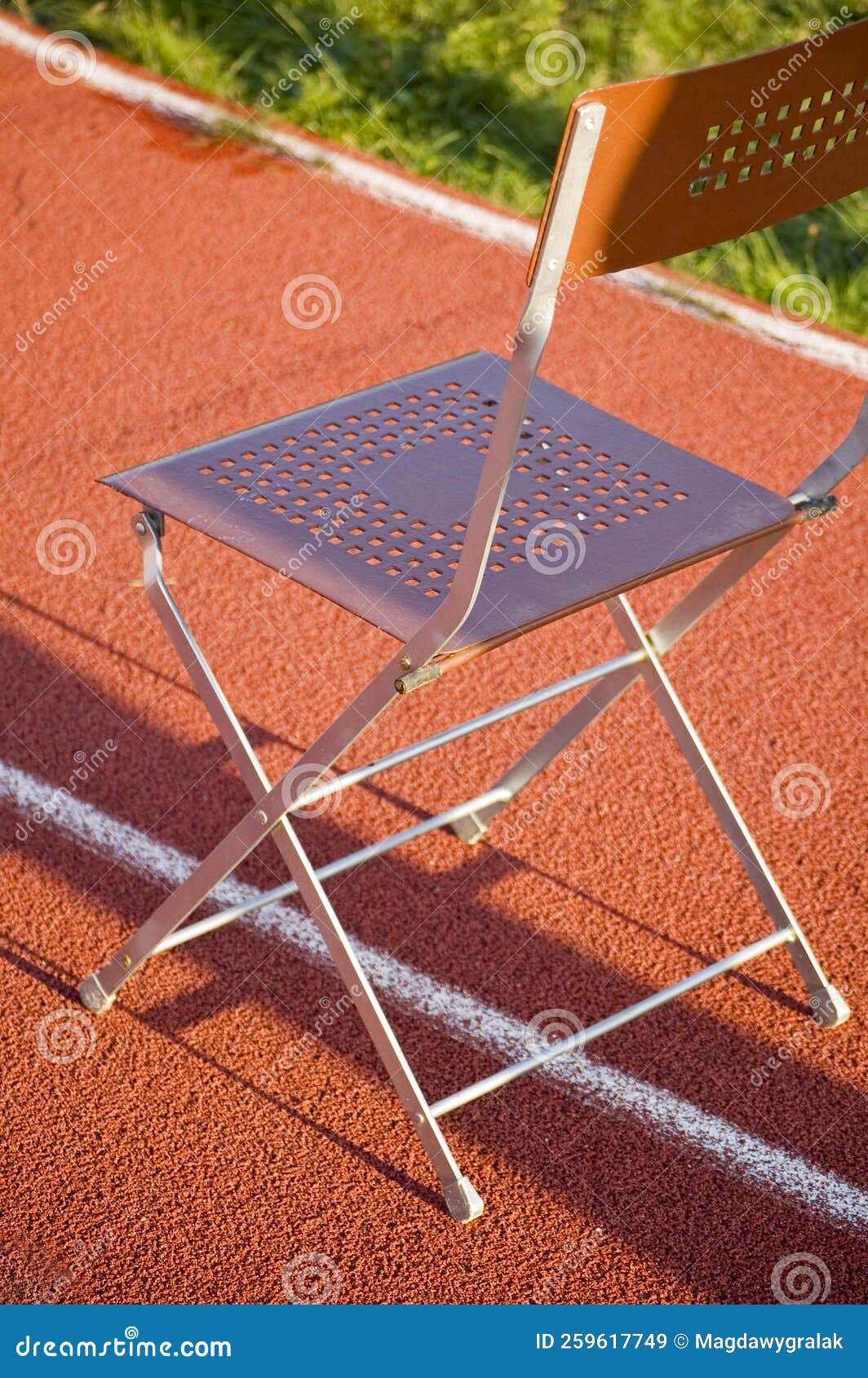 Chair Standing on the Athletics Track. Stock Image - Image of ...