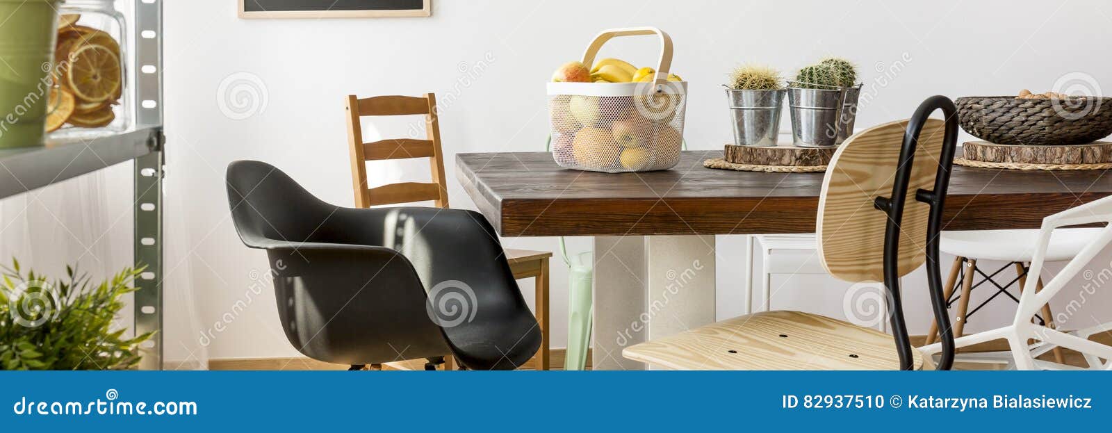 Chairs around wooden table stock photo. Image of light - 82937510