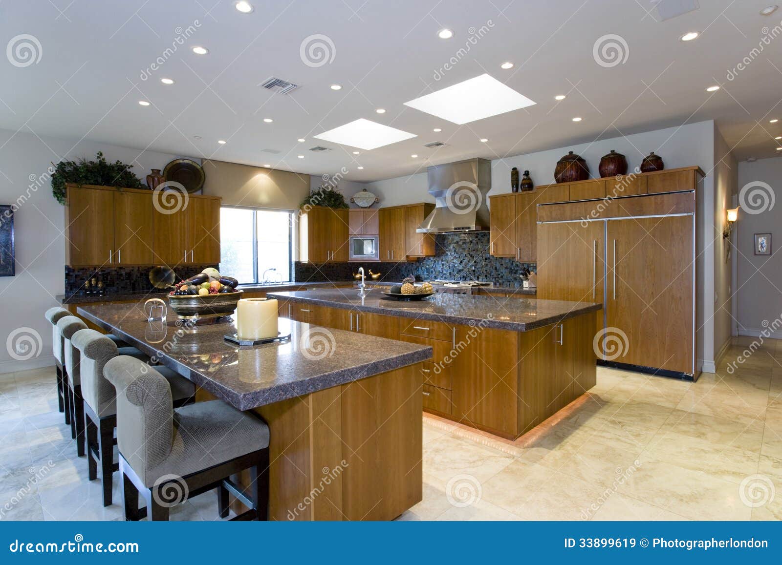 Chairs at Counter in Spacious Kitchen Stock Image - Image of countertop ...