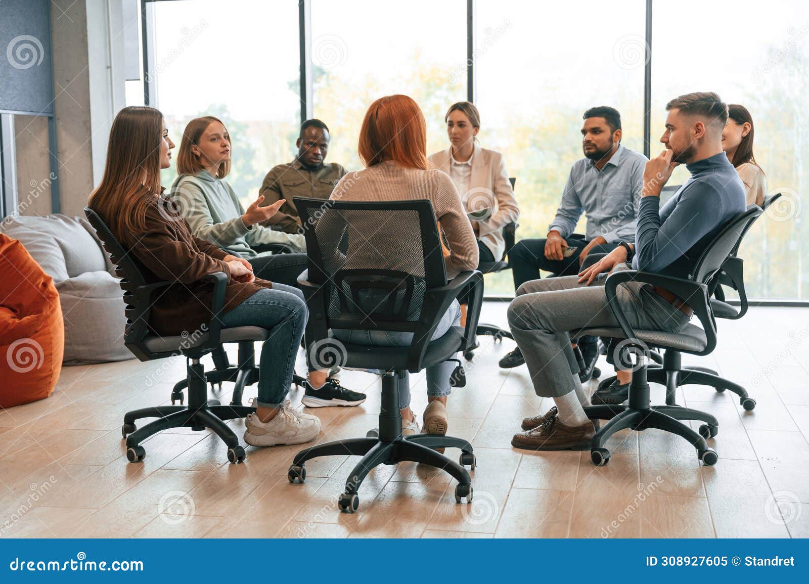 On the Chairs. Group of People are Having Therapy Meeting Together ...
