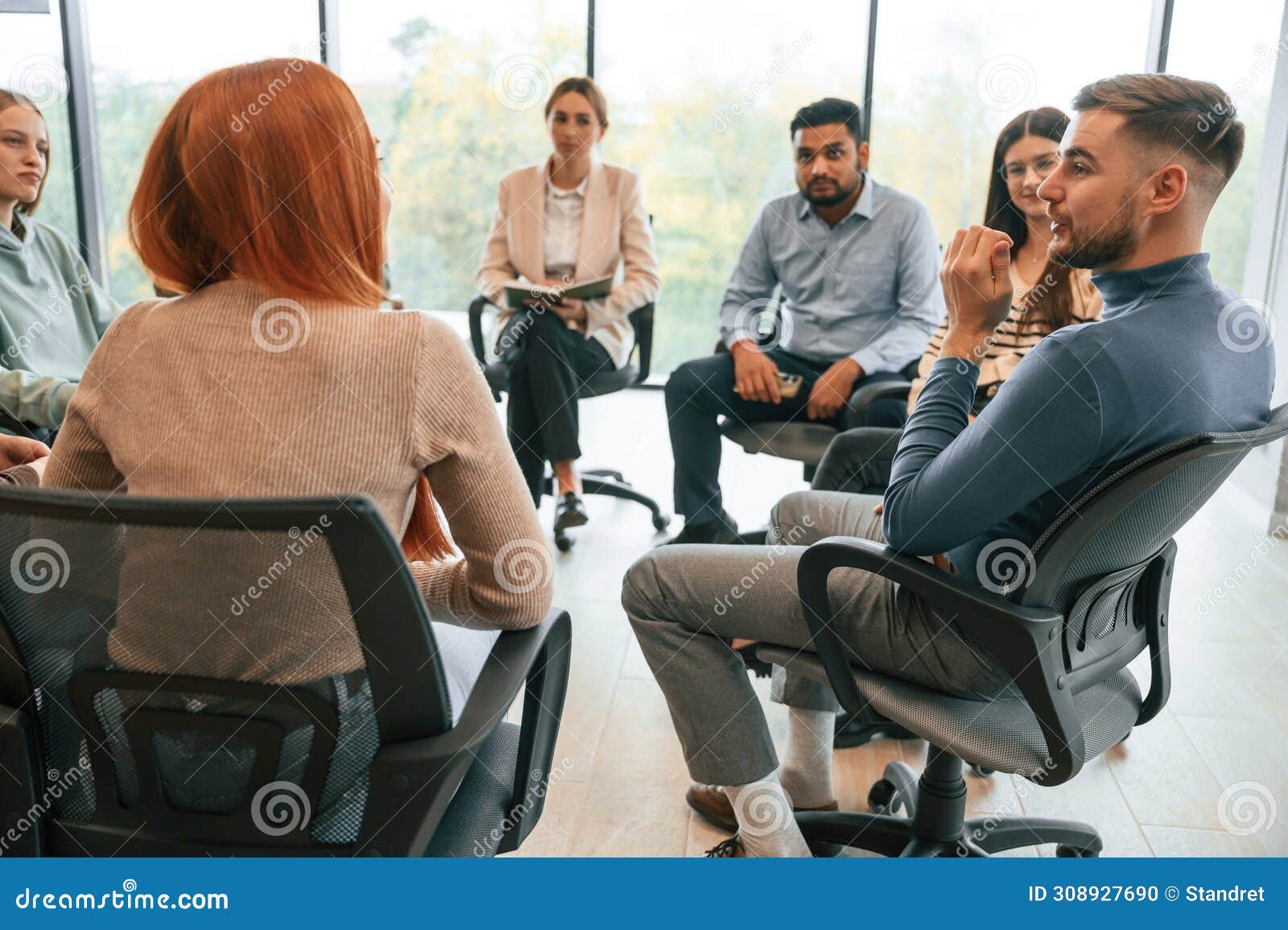 On the Chairs. Group of People are Having Therapy Meeting Together ...