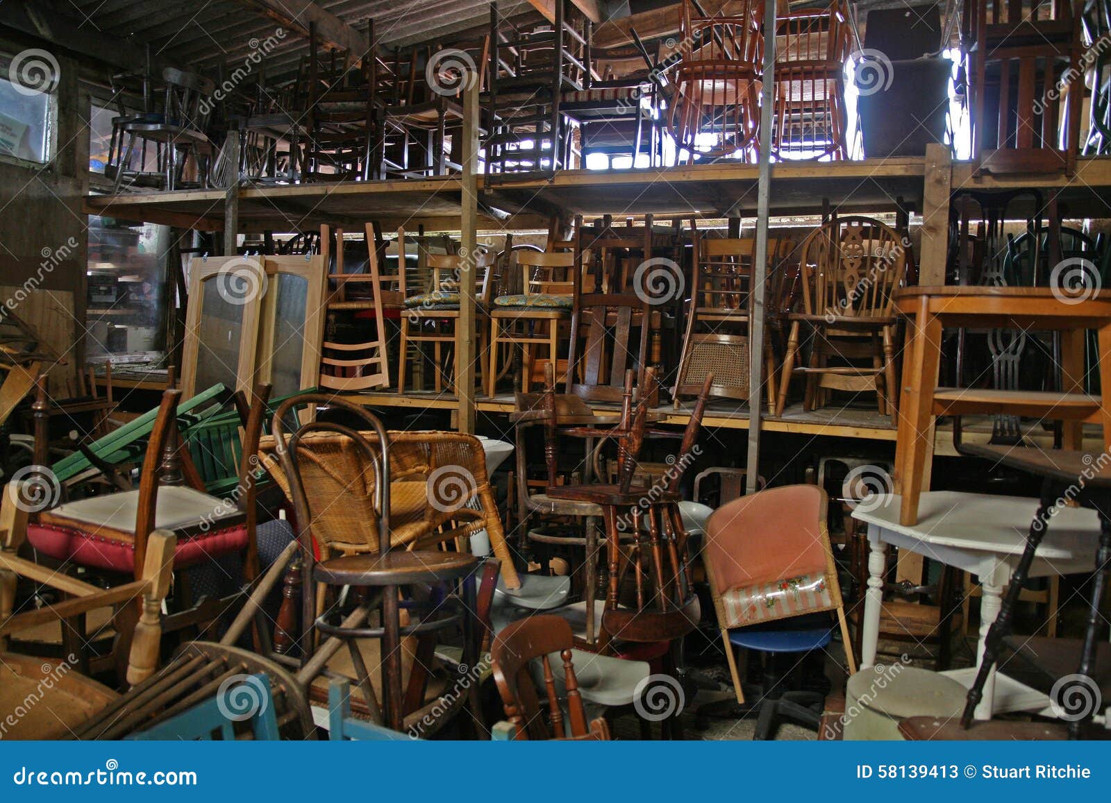 Chairs piled high stock image. Image of wooden, chairs - 58139413