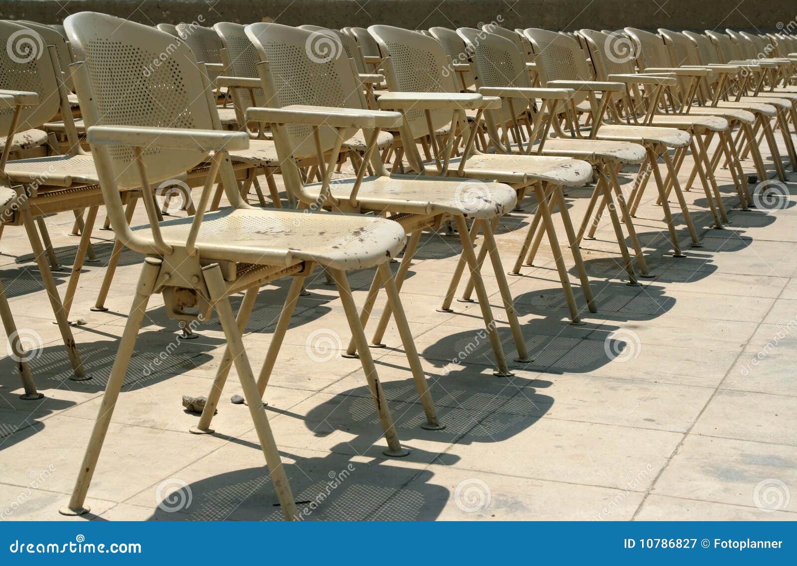 Chairs in a rows stock image. Image of chairs, ground - 10786827