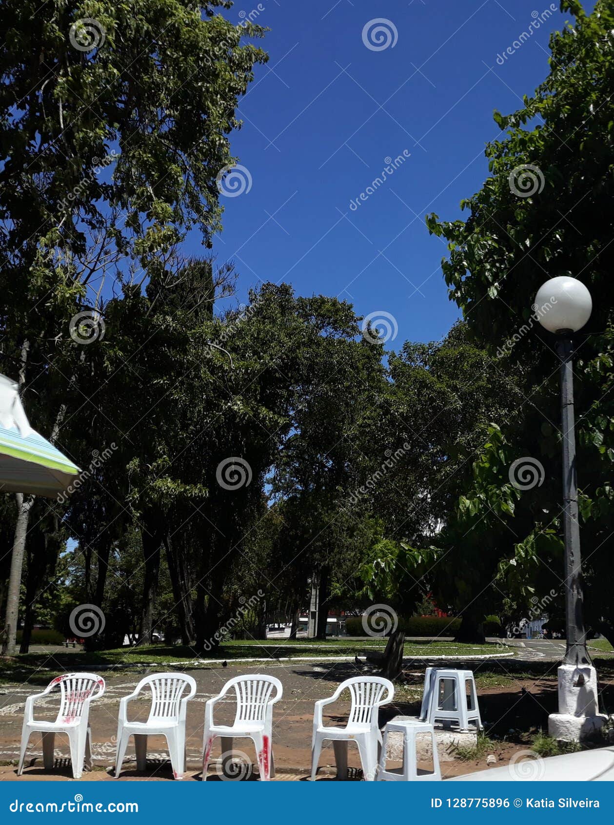 Chairs Scattered in a Square Stock Photo - Image of square, plastic ...