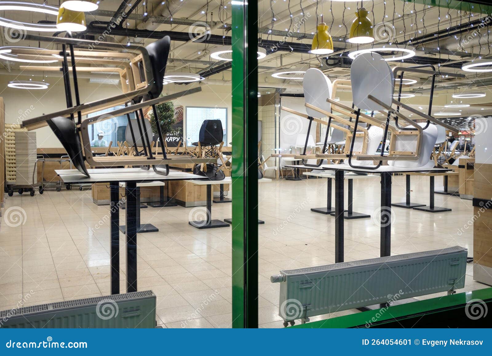 Chairs on a Table in an Empty Mall Restaurant after Work is Completed ...