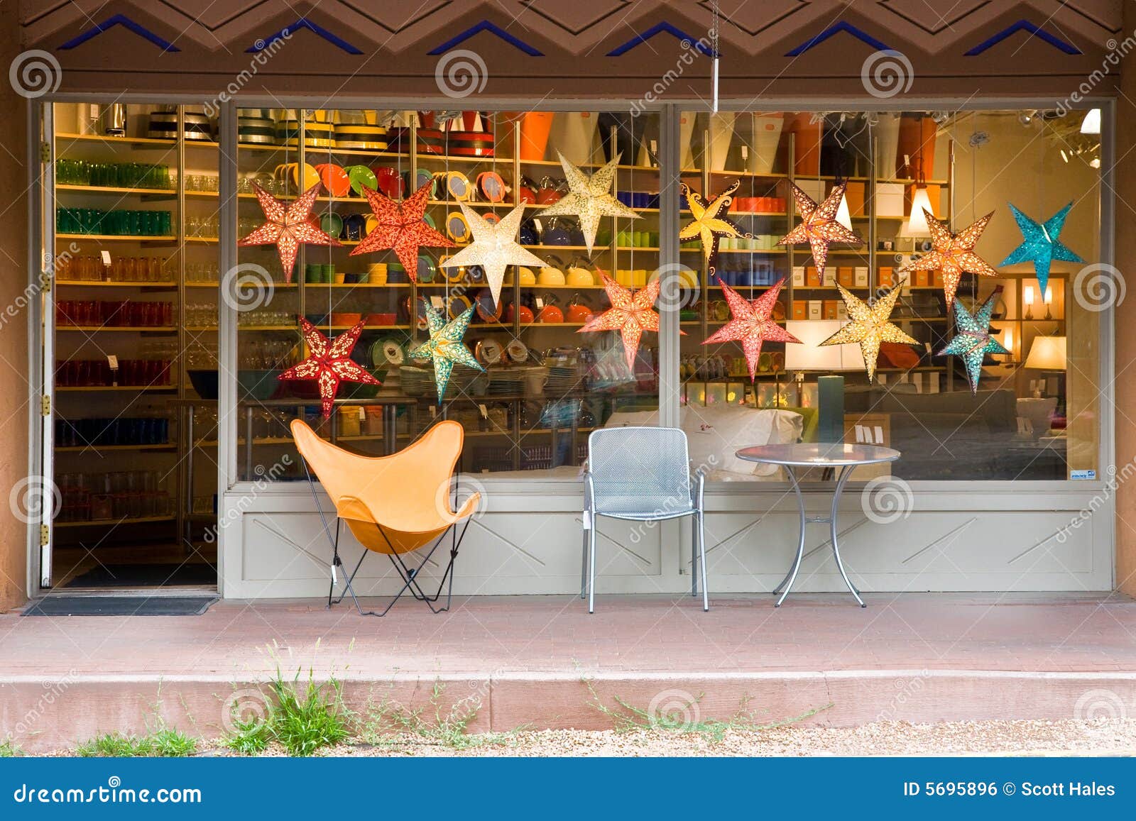 Chairs and Table in Front a Store Front Stock Photo - Image of stars ...
