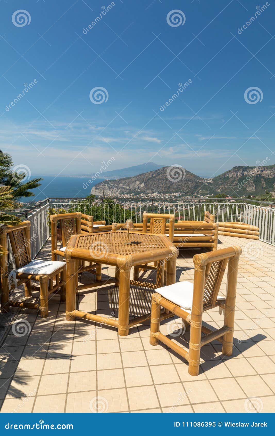 Chairs And Table On The Terrace Overlooking The Bay Of Naples And