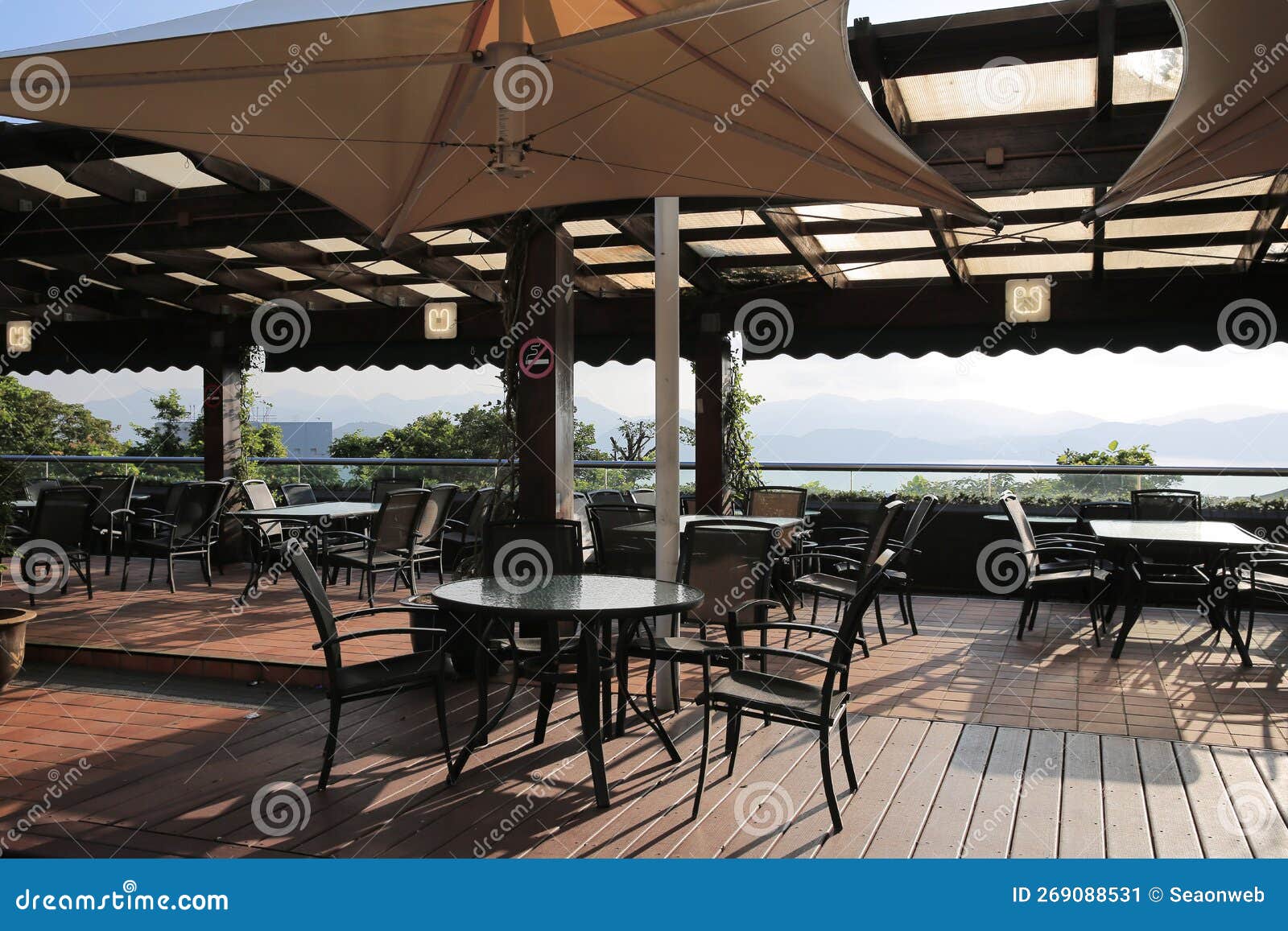 A Chairs and Table Under the Tree Stock Image - Image of table ...