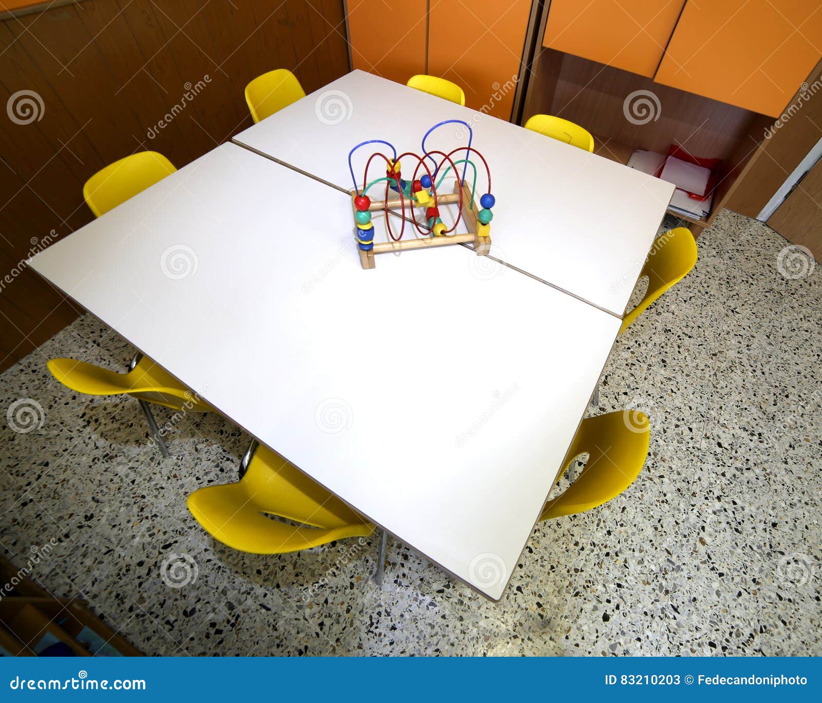 Chairs with a Toy Over the Desk Inside the Kindergarten Stock Image ...