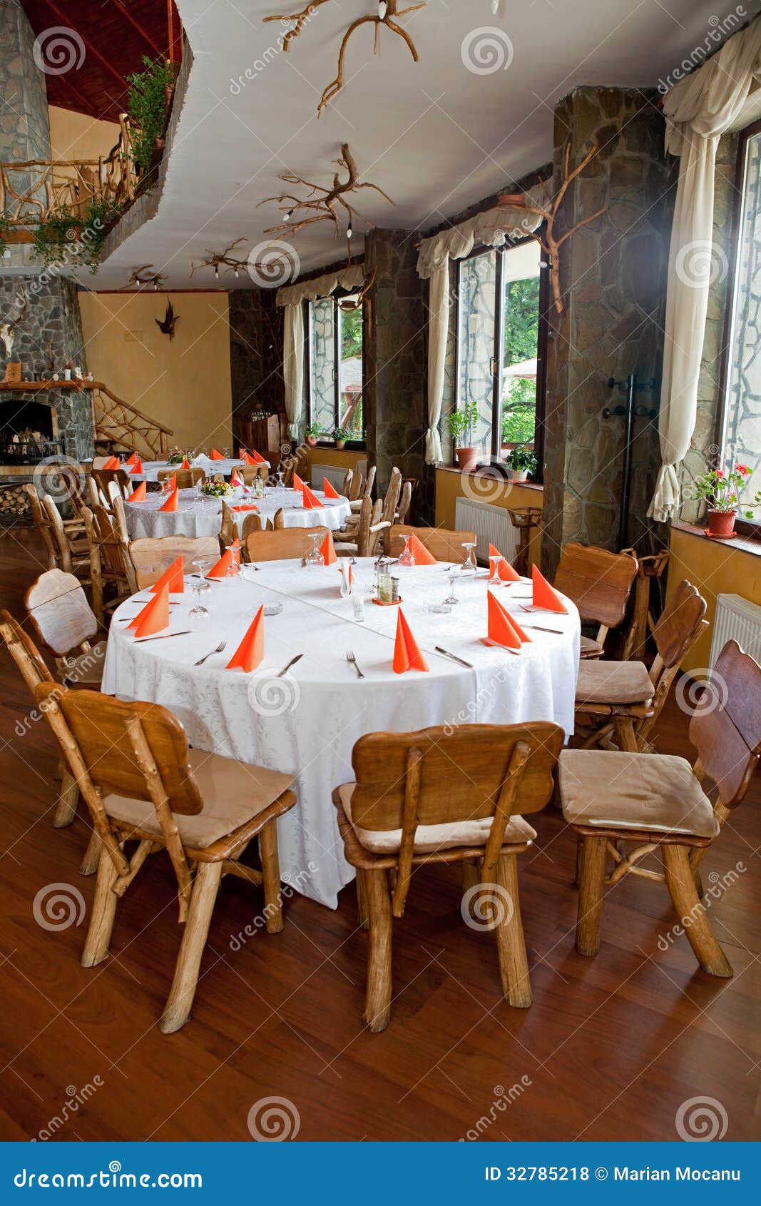 Chairs and Wooden Table in Rustic Restaurant Stock Photo - Image of ...
