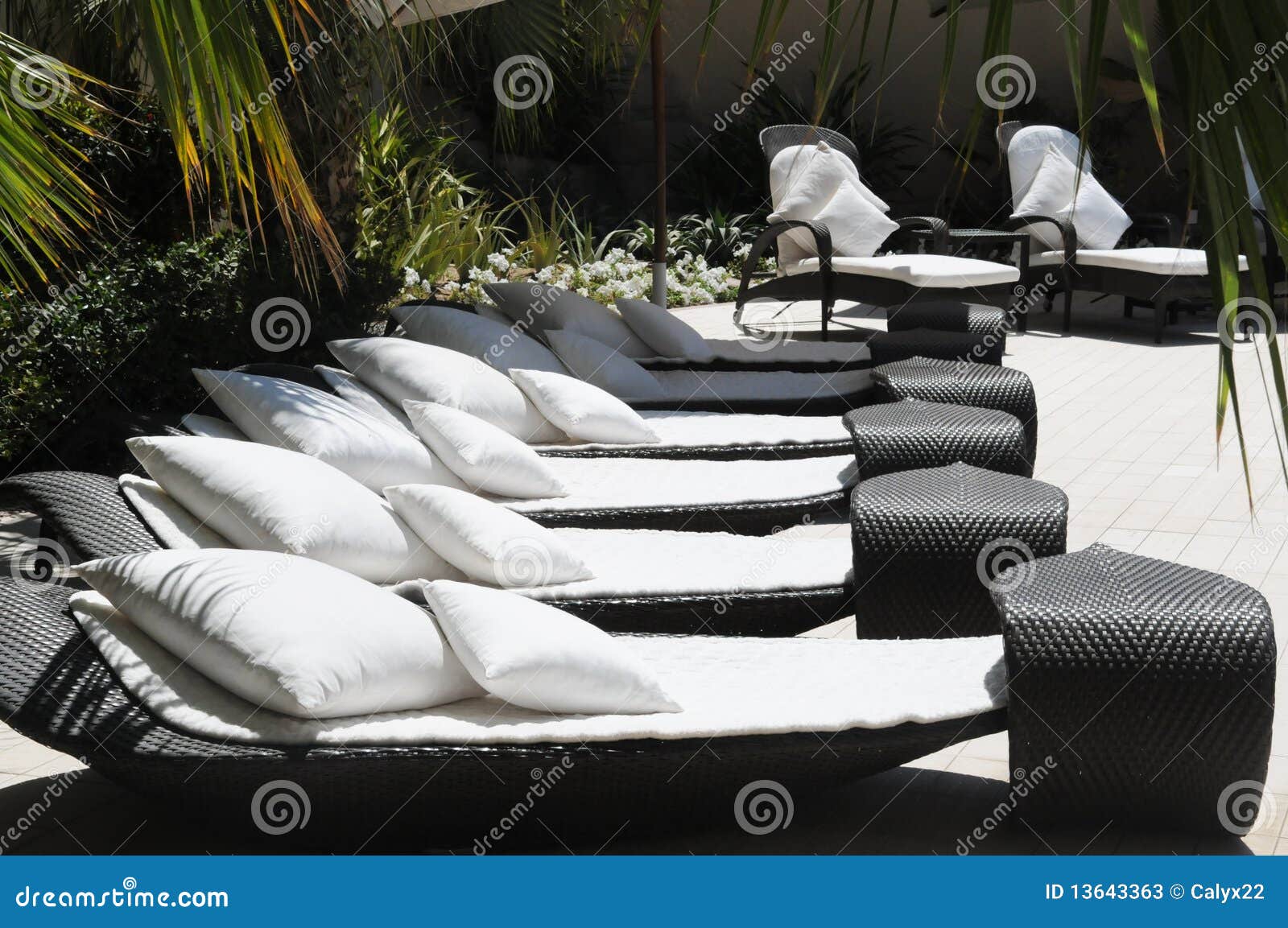 Chaise Lounges stock image. Image of shaded, arabia, lounge - 13643363