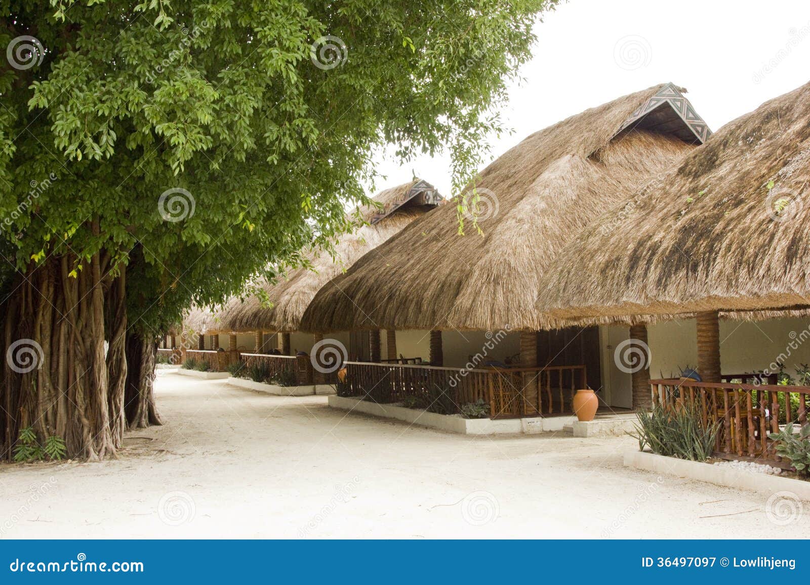 Chalets With Thatched Roofs Royalty-Free Stock Photo | CartoonDealer ...