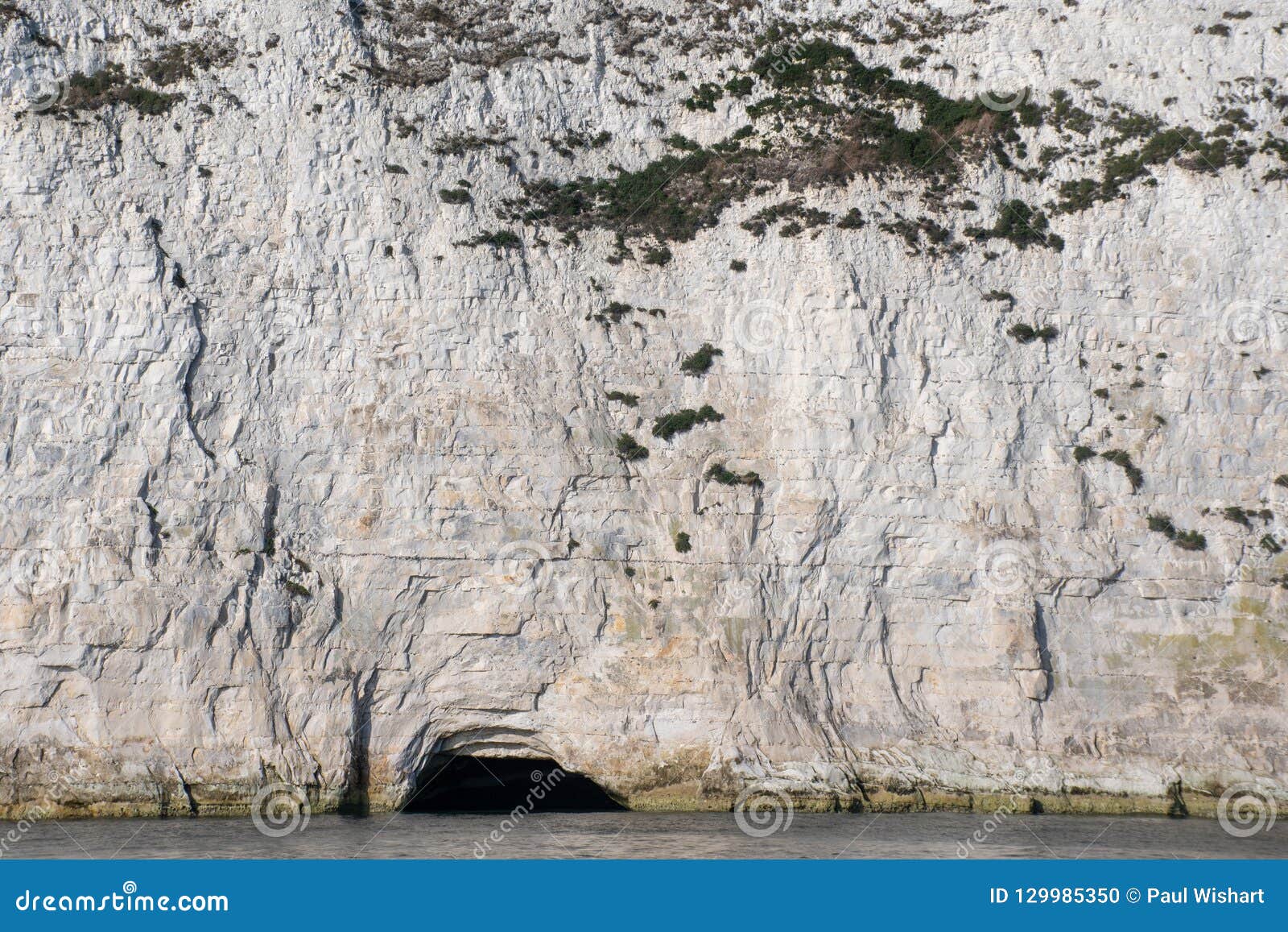 Chalk Cliff Face with Cave at Bottom Stock Photo - Image of geology ...