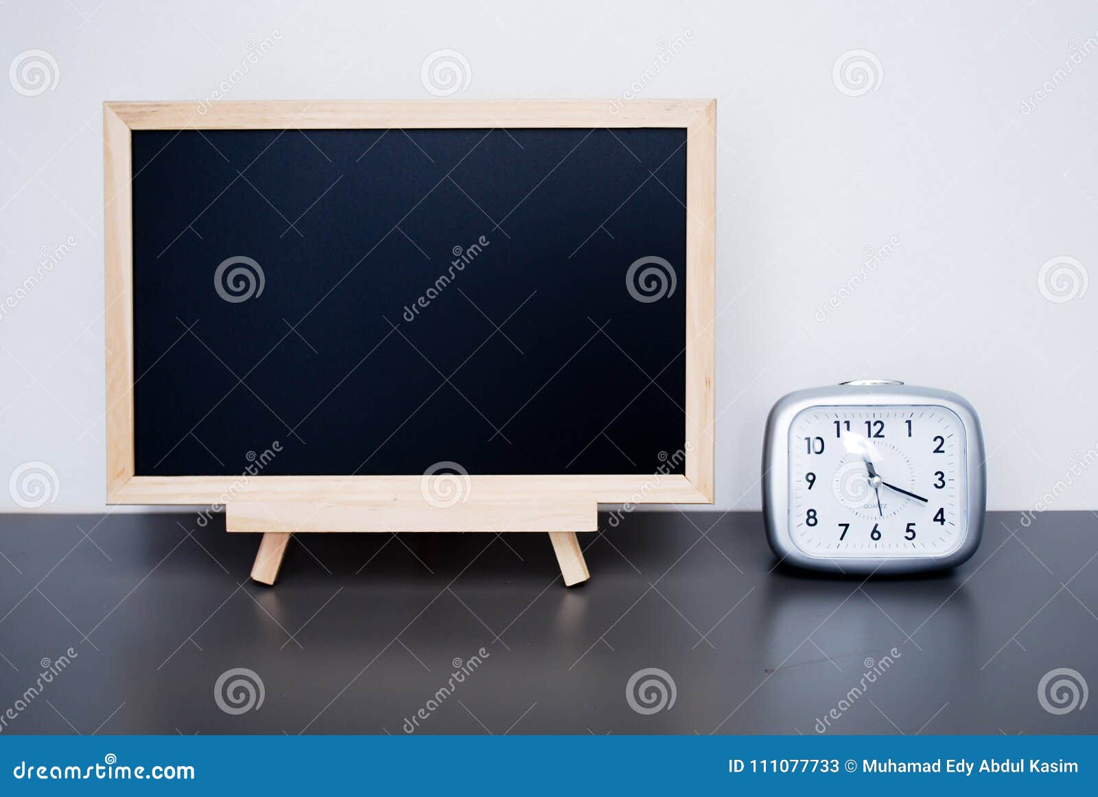 Chalkboard and clock stock image. Image of teacher, table - 111077733