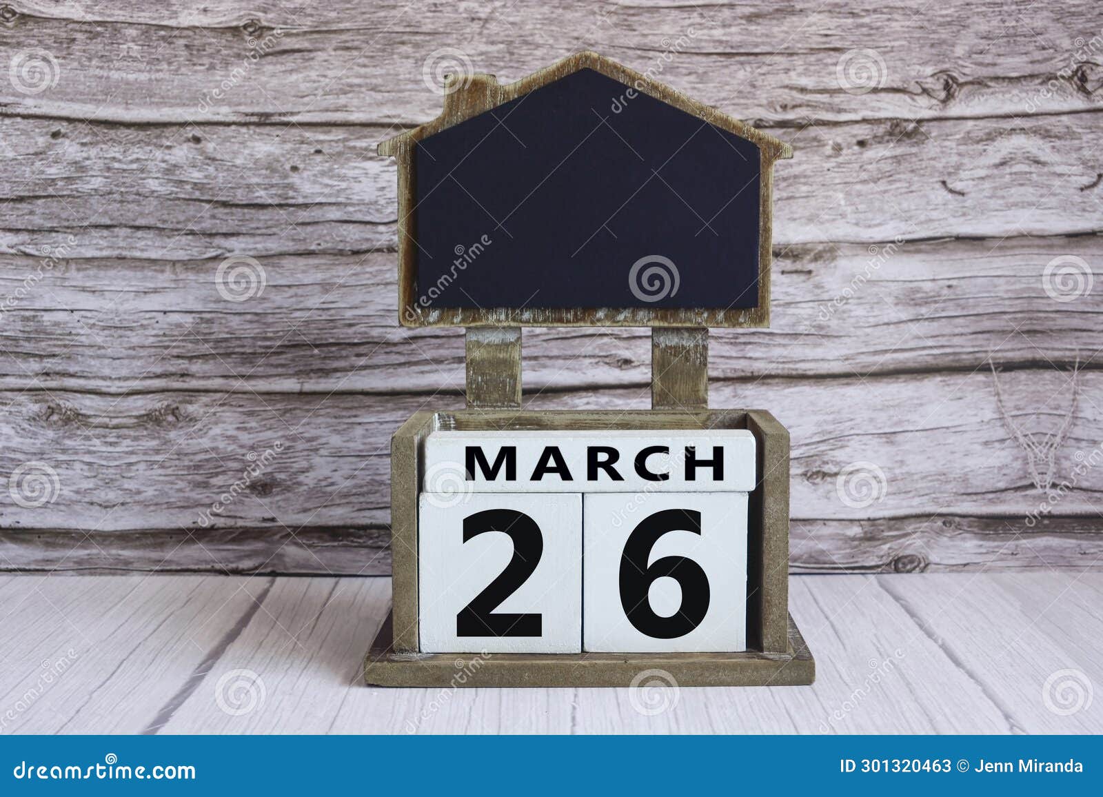 Chalkboard with March 26 Date on White Cube Block on Wooden Table ...