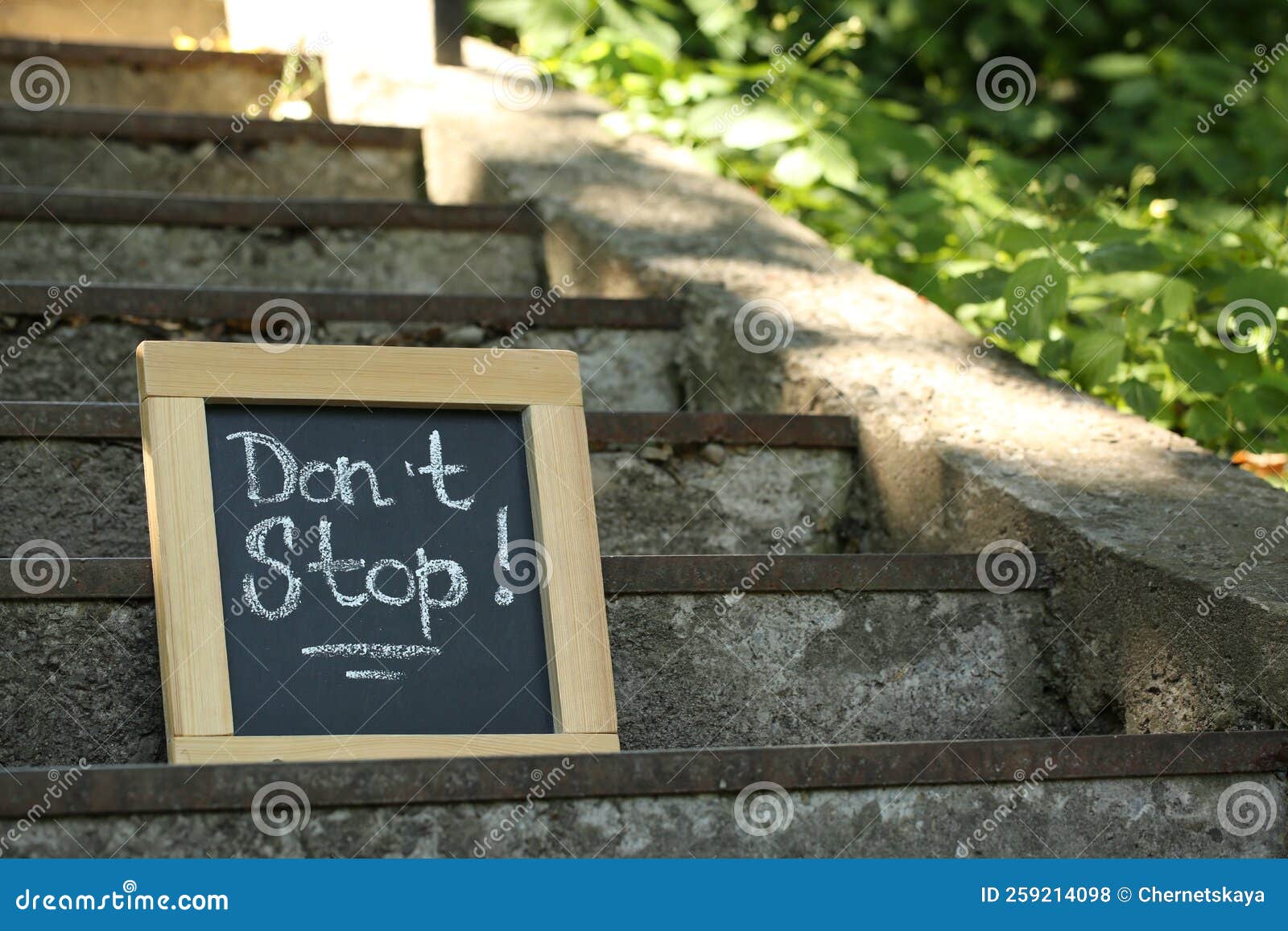 Chalkboard with Phrase Don`t Stop on Stone Stairs Outdoors, Space for ...