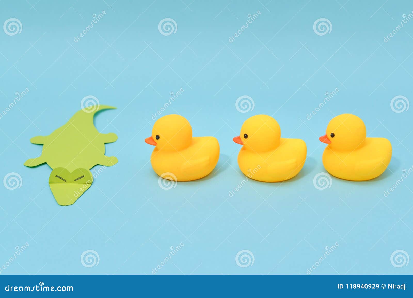 Challenge Concept, Rubber Ducks are Facing Crocodile. Stock Image ...
