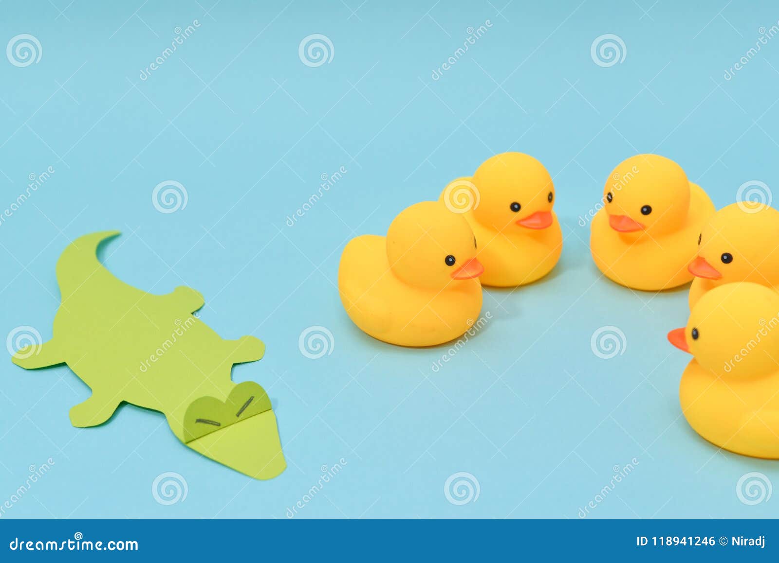 Challenge Concept, Rubber Ducks are Facing Crocodile Stock Photo ...