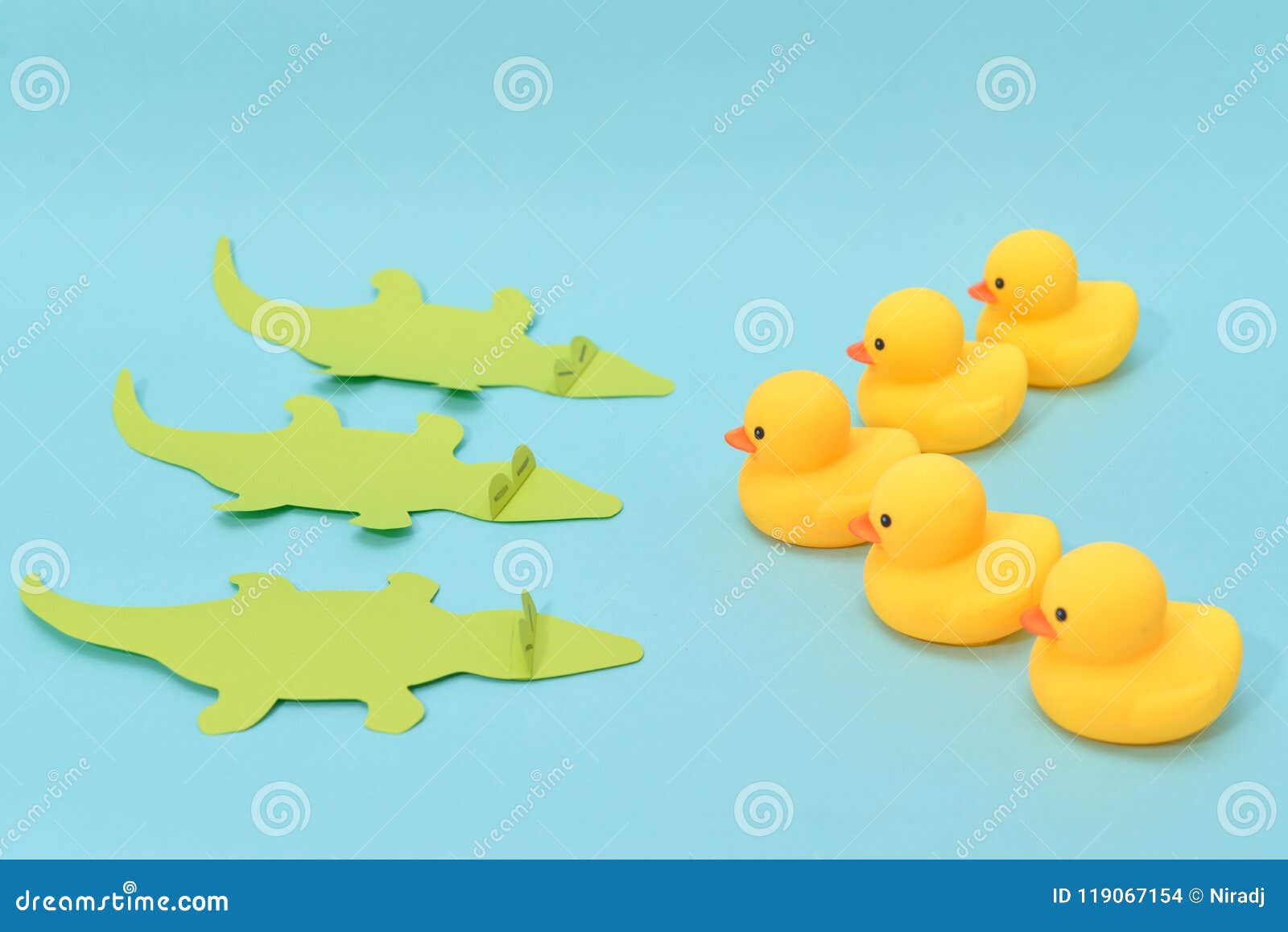 Challenge Concept, Rubber Ducks are Facing Crocodiles. Stock Photo ...
