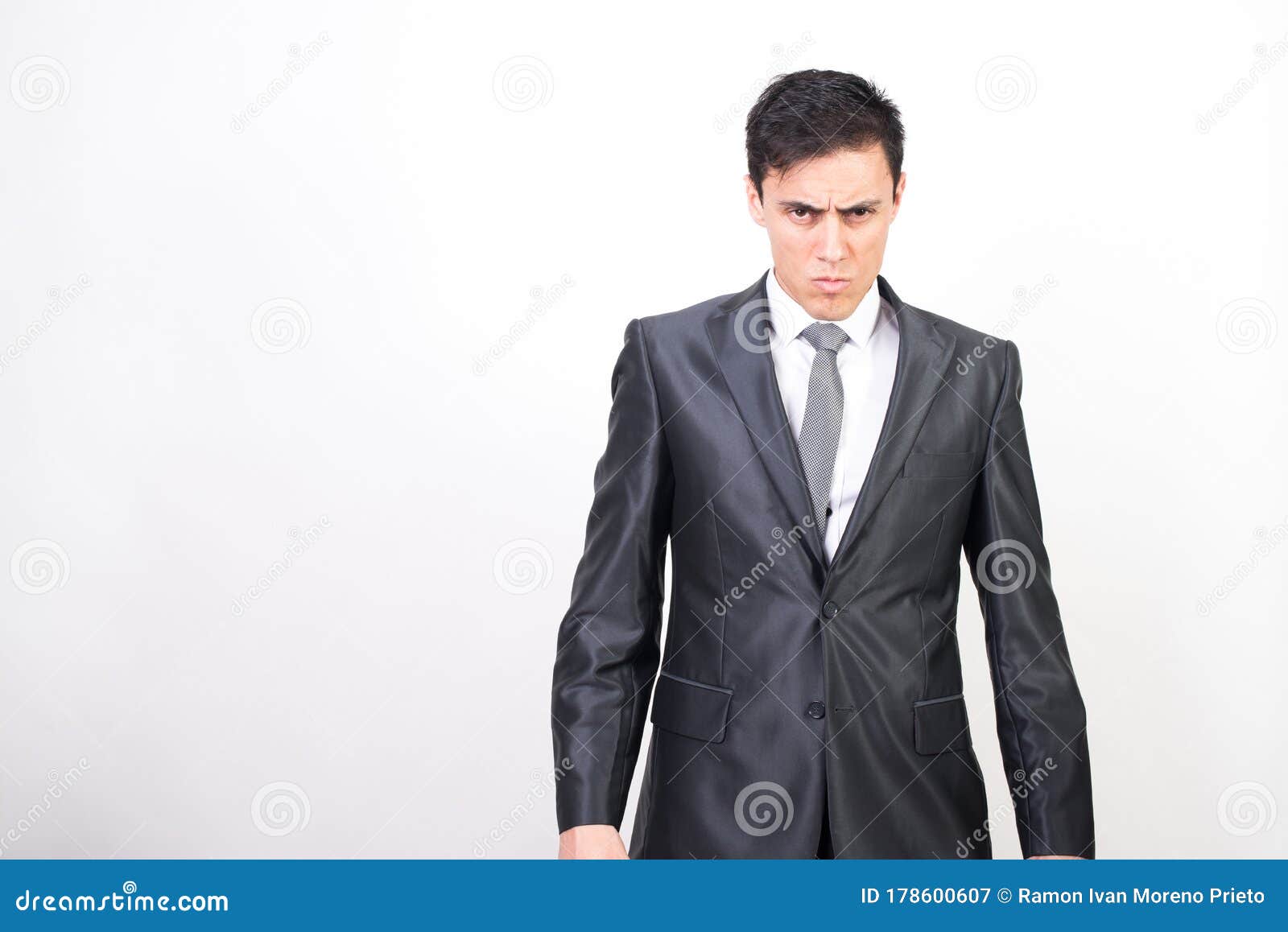 Challenging man in suit stock image. Image of background - 178600607