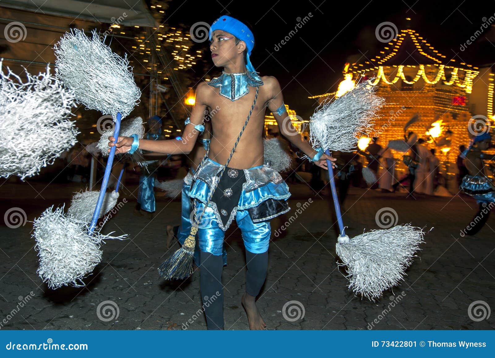 A Chamara Dancer Performs In Front Of The Temple Of The Sacred Tooth ...