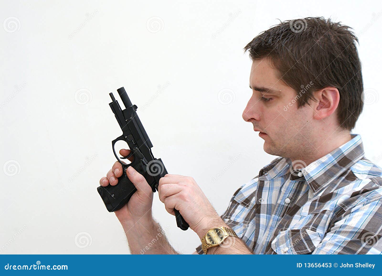 Chambering the Round stock image. Image of shoot, mugging - 13656453