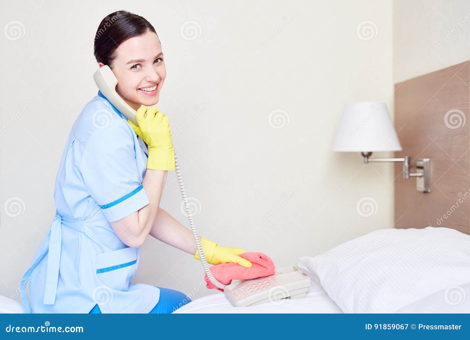 Chambermaid working stock image. Image of tidy, lampshade - 91859067