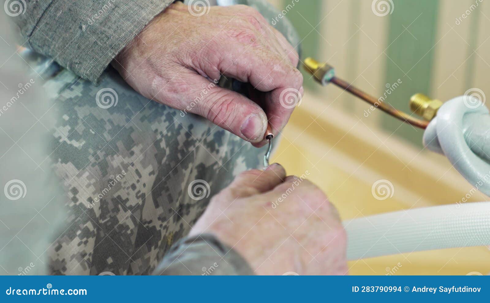 Chamfering of Copper Pipe. Process of Removing Pointed Edge at End of ...