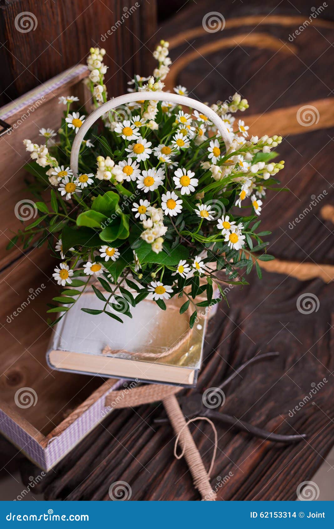 Chamomile Decor Composition with Books and Box on the Brown Wood Table ...