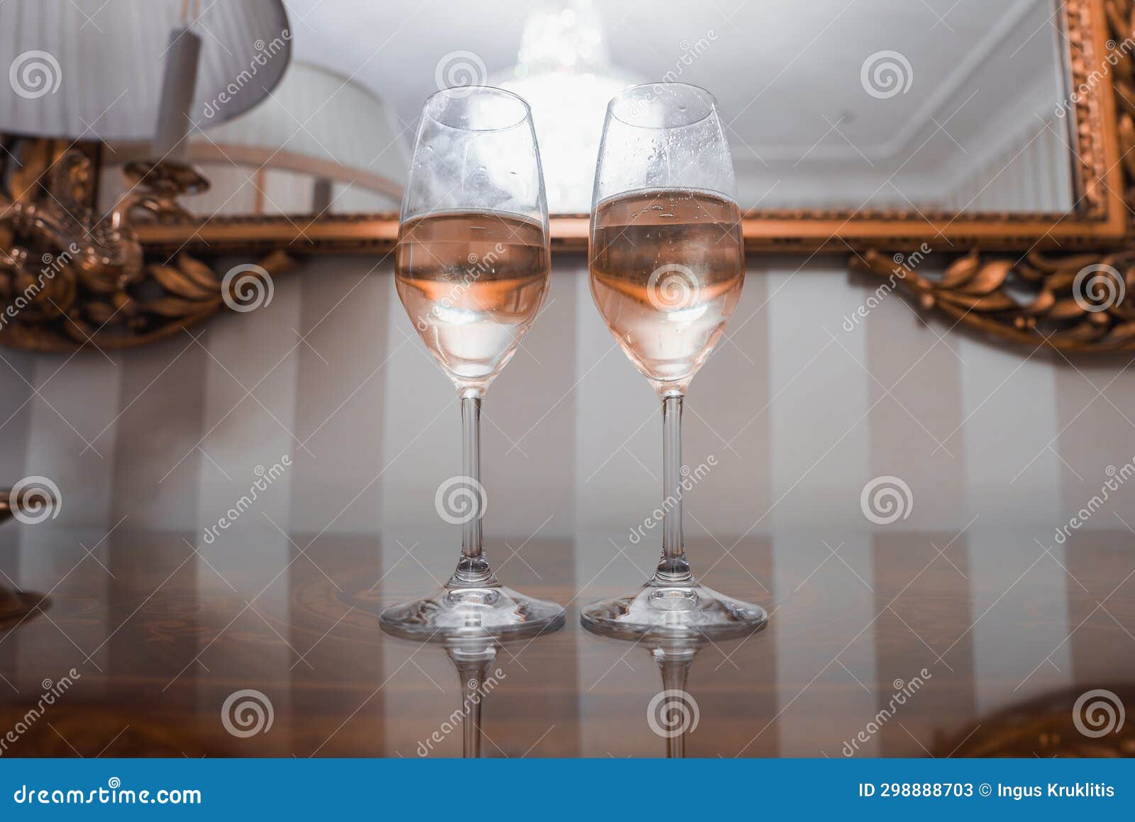 Champagne Flutes on Table with Mirror Reflection - Elegant and ...
