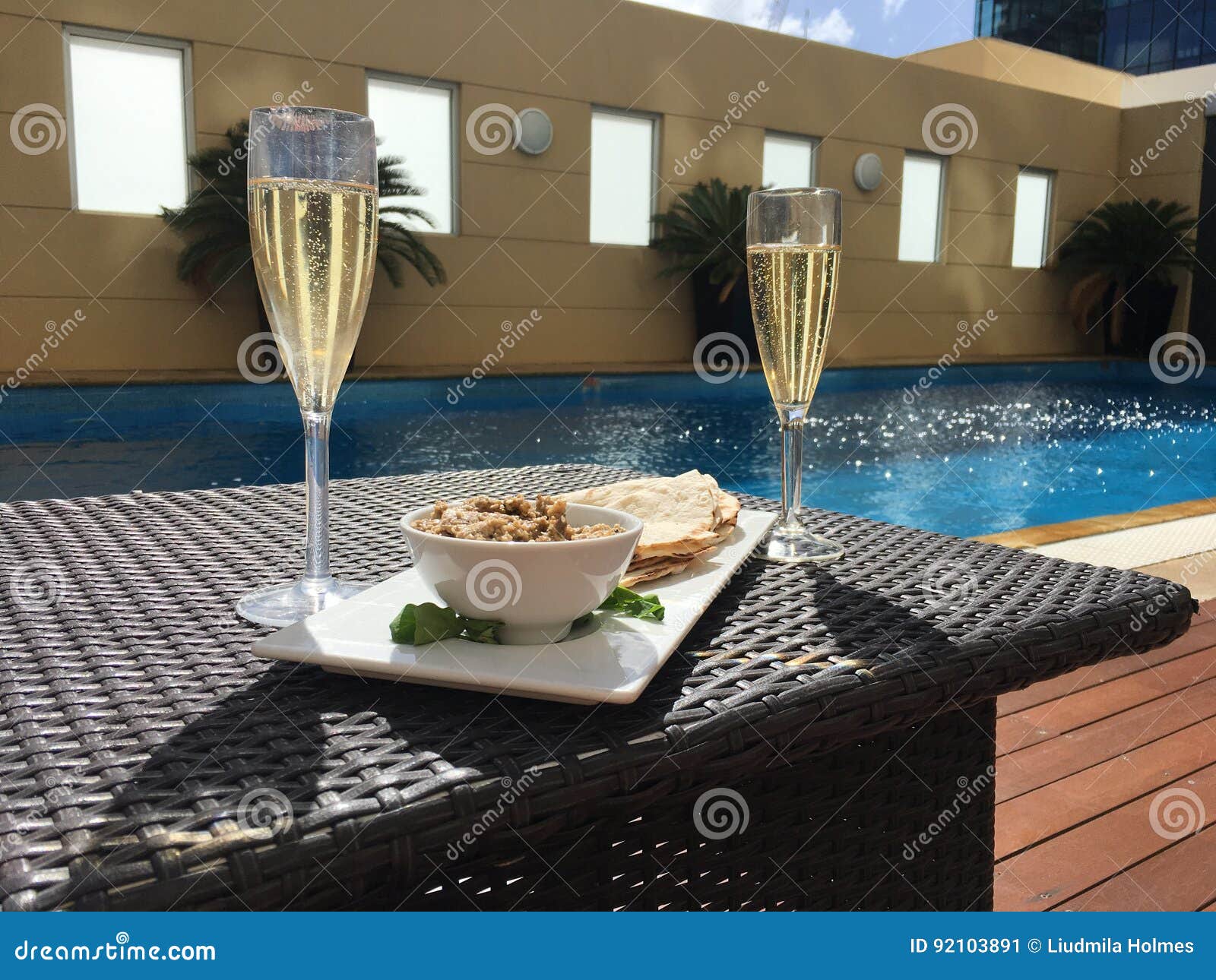 Champagne by the pool stock image. Image of tourism, indulge - 92103891