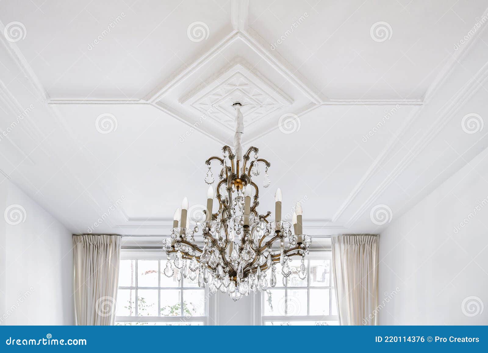 Chandelier on the ceiling stock photo. Image of hanging - 220114376