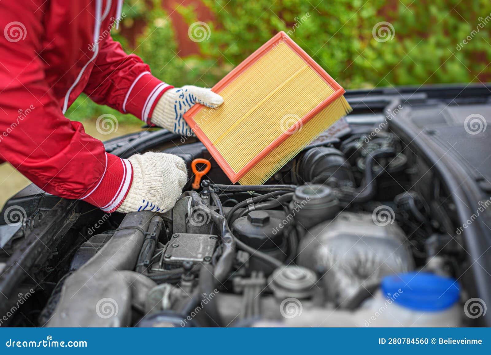 Change the Filter on the Car Engine during Vehicle Maintenance. Stock ...