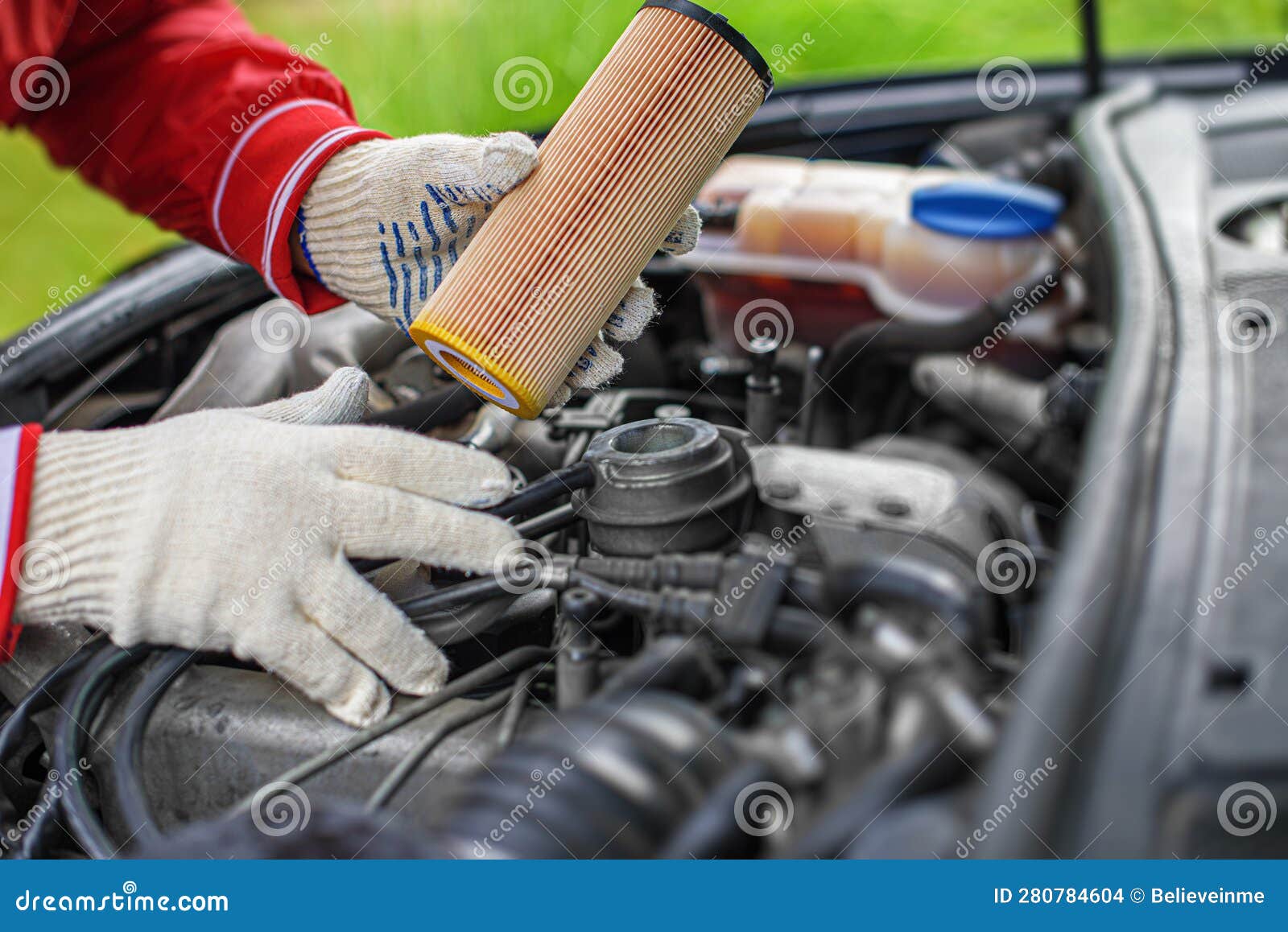 Change the Filter on the Car Engine during Vehicle Maintenance. Stock ...