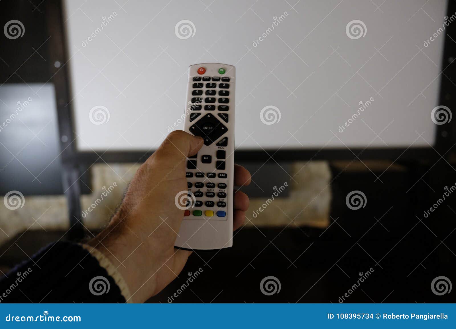 Change Channel with the Remote Control Stock Photo - Image of holding ...