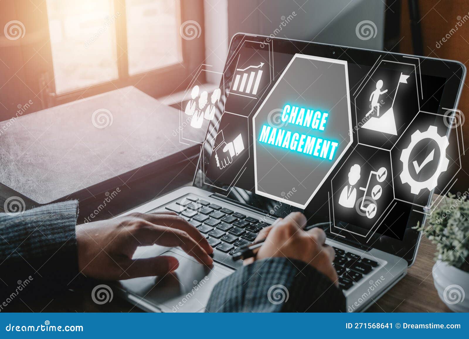 Business Person Working on Laptop Computer with Change Management Icon ...