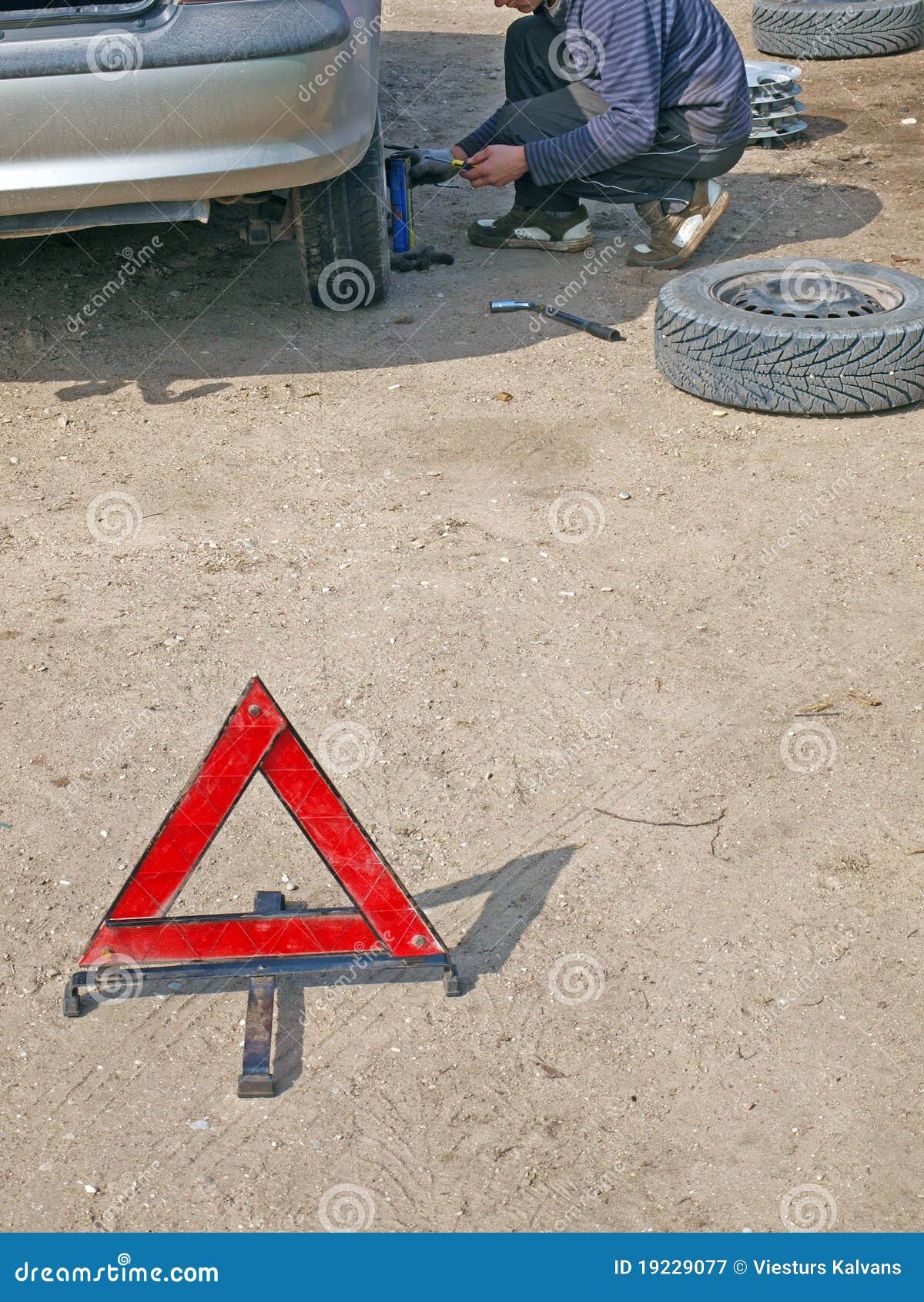 Change tire 2 stock image. Image of triangle, road, sign - 19229077
