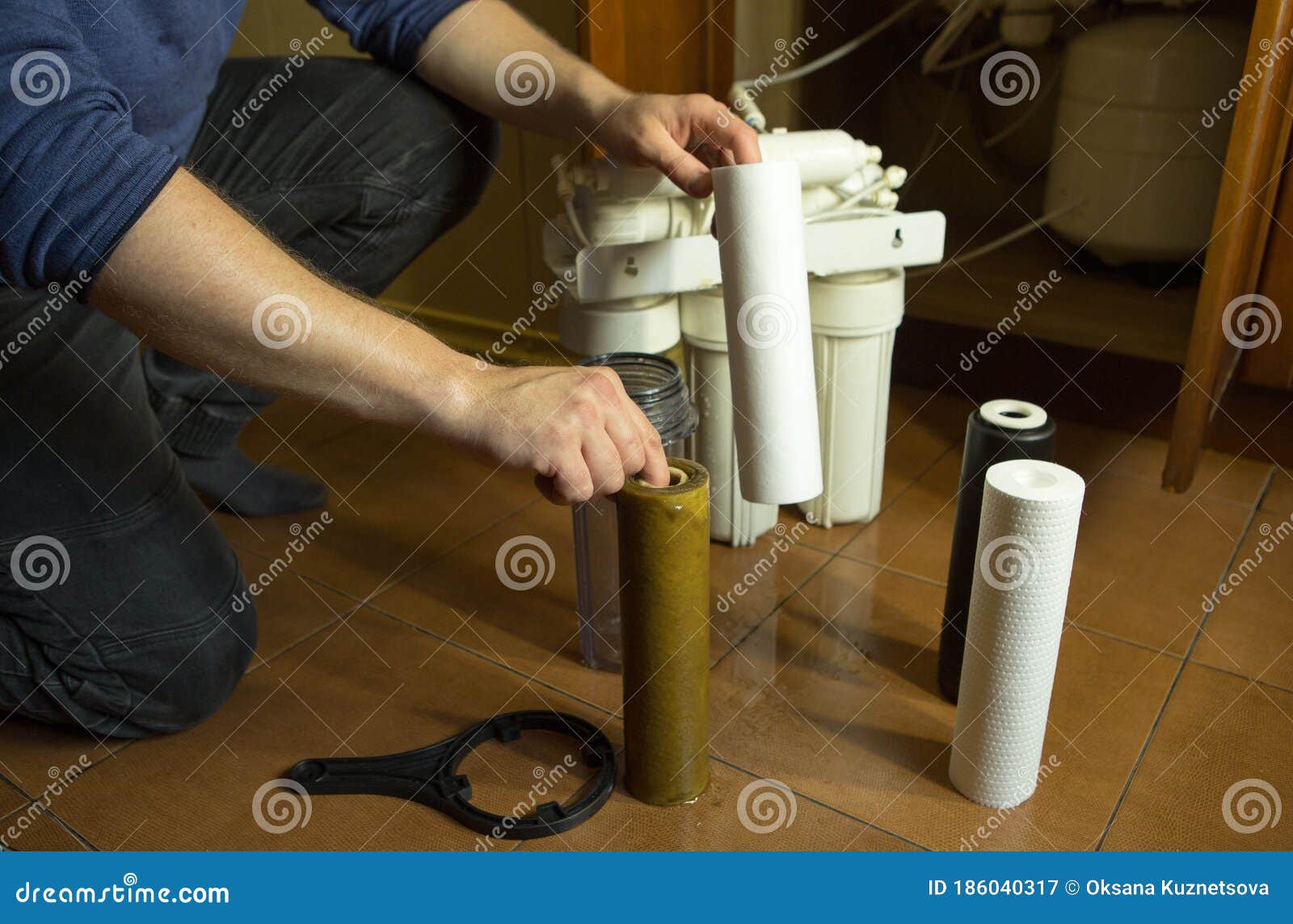 Changing Filters in Your Home Water Purification System. the Master ...