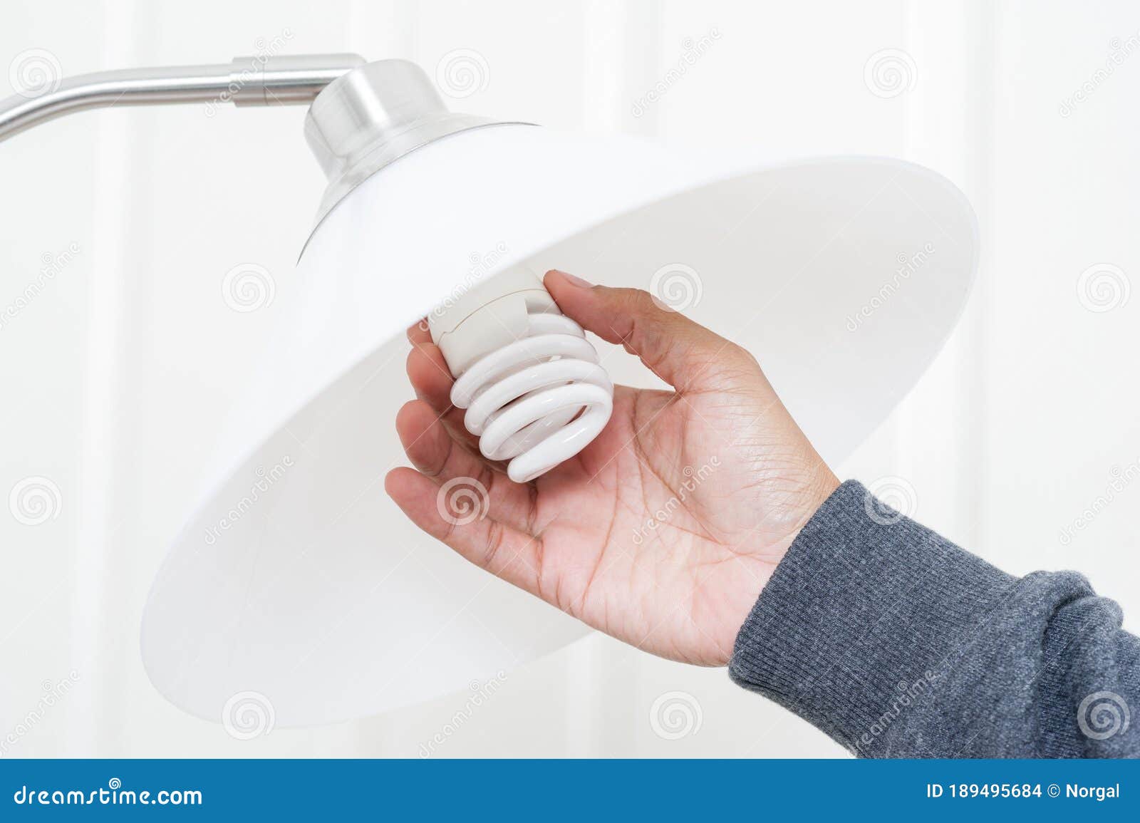 Changing light bulb stock photo. Image of electricity - 189495684