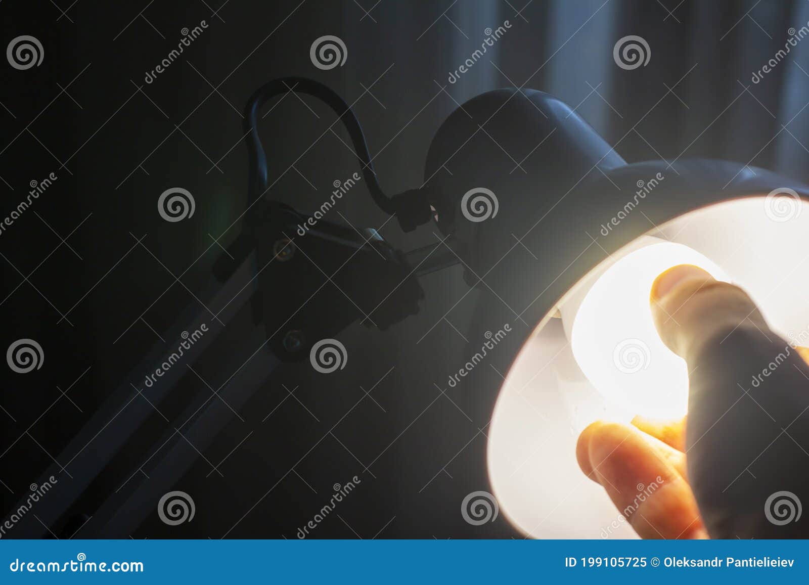 Changing of a Light Bulb. Removing Bulb from the Socket Stock Image ...