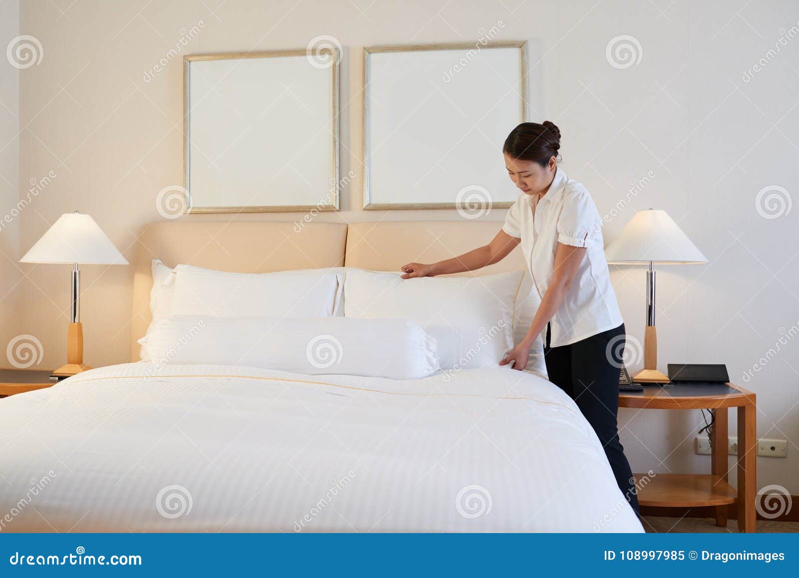 Changing linen stock image. Image of young, occupation - 108997985