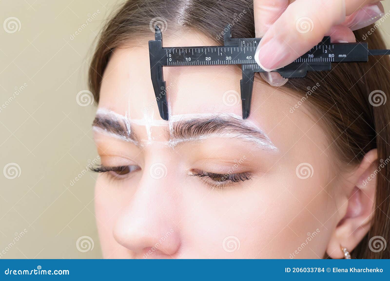 Changing Shape of the Eyebrows. Eyebrow Stylist Measuring Eyebrow with ...