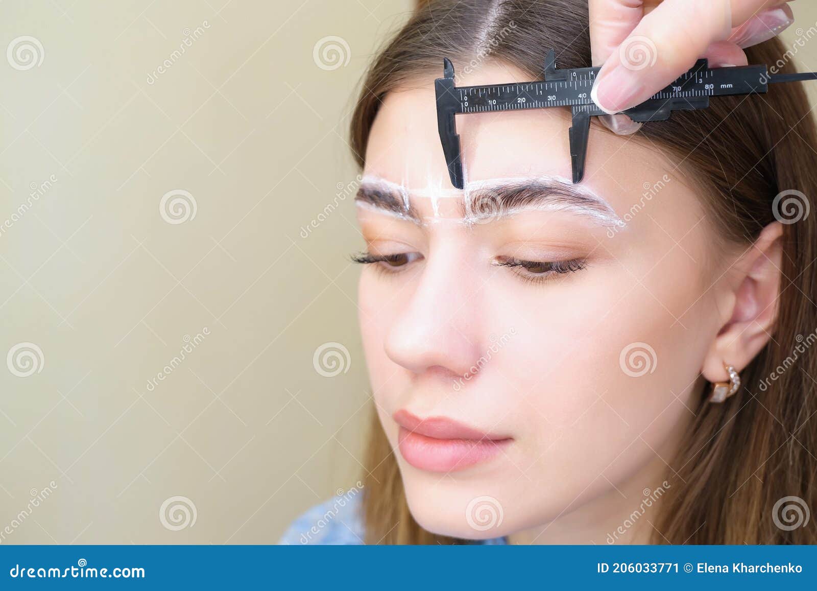 Changing Shape of the Eyebrows. Eyebrow Stylist Measuring Eyebrow with ...